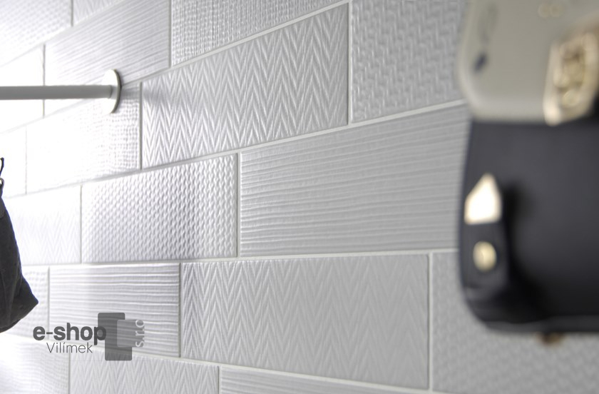 Vzorovaný dekor Tonalite Scandi Carving Grigio 10x40 - šedá